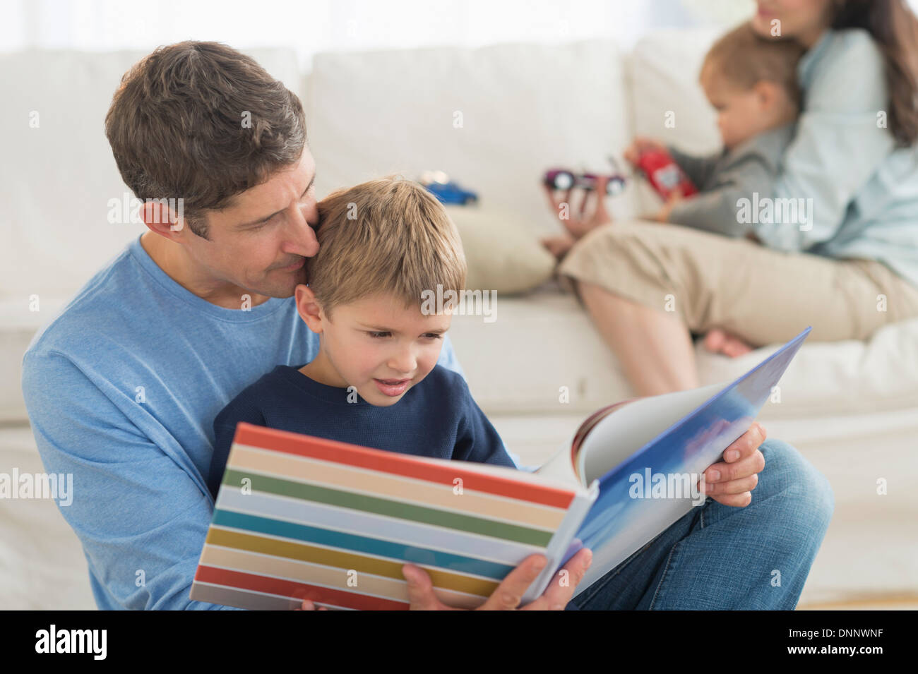 Father reading to his children hi-res stock photography and images - Alamy