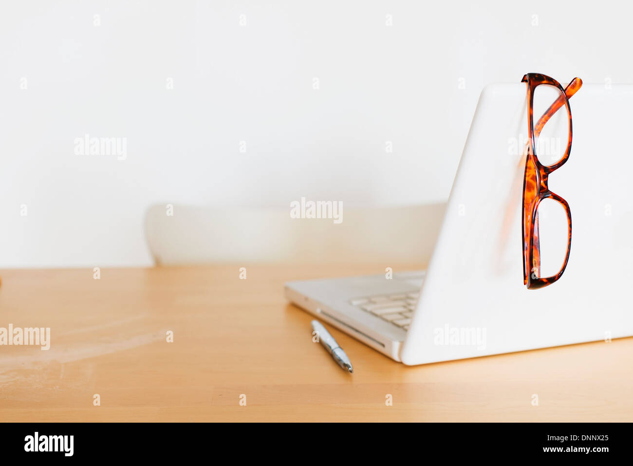 Laptop eyeglasses hi-res stock photography and images - Alamy