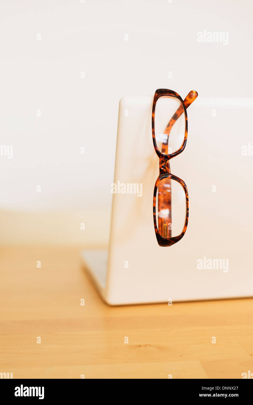 Laptop eyeglasses hi-res stock photography and images - Alamy