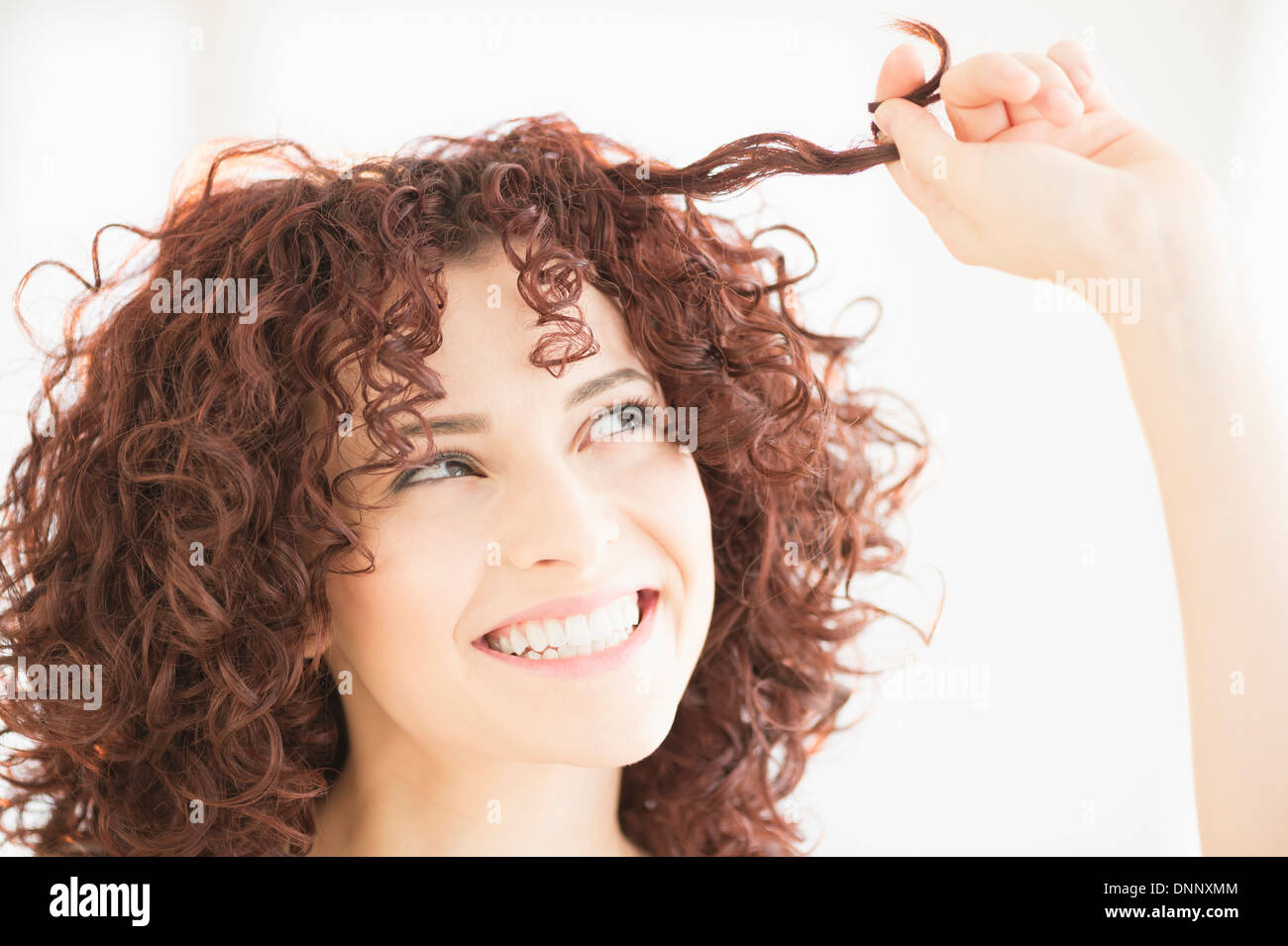 Happy beautiful woman curly hair hi-res stock photography and images ...