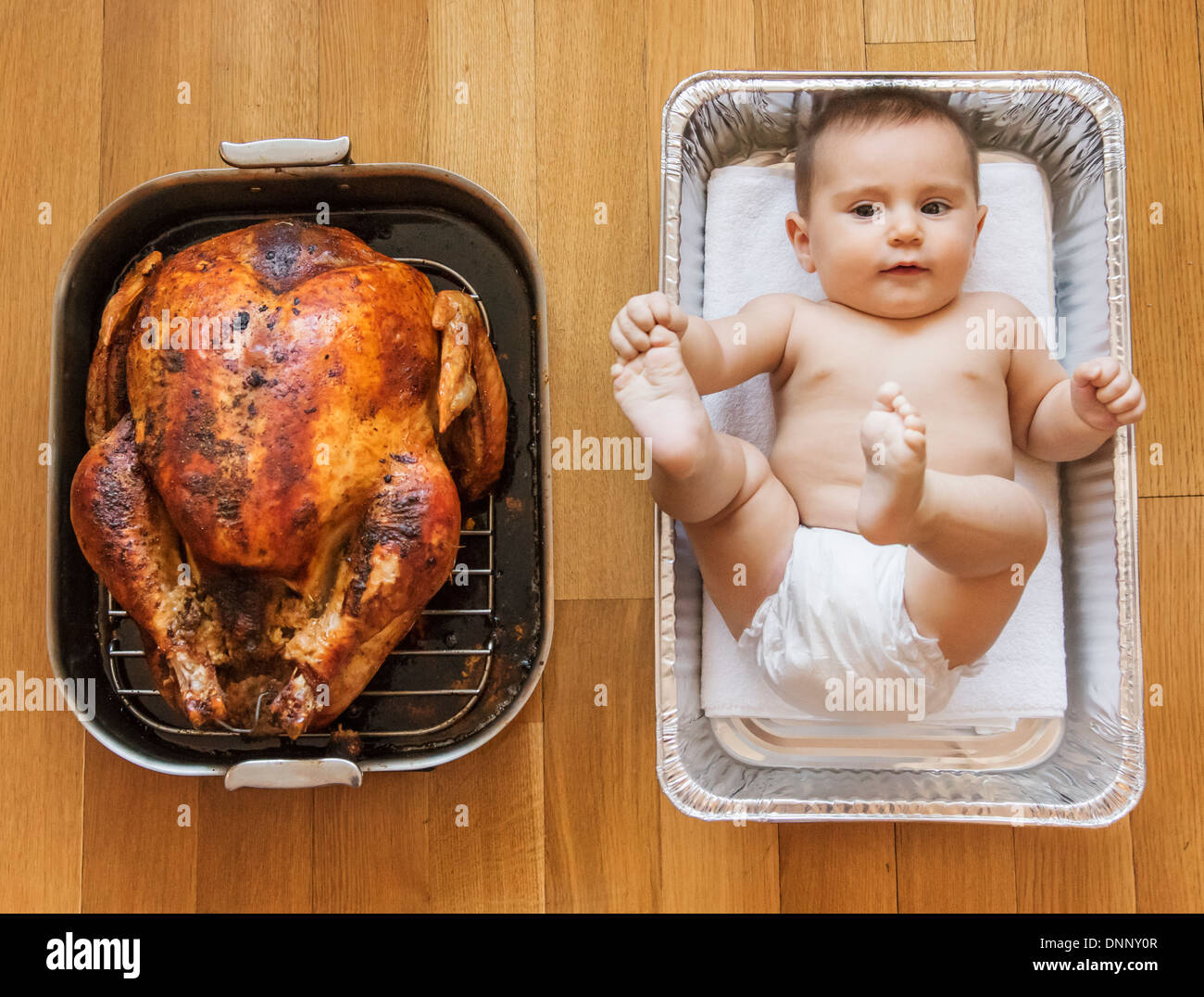 Baked turkey and baby girl (2-5 months) in baking dish Stock Photo - Alamy