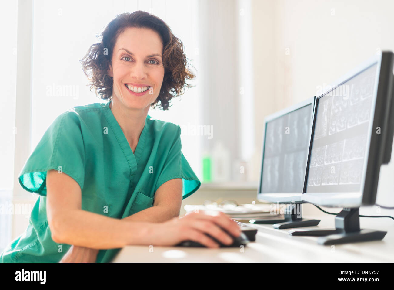 Smile working computer hi-res stock photography and images - Alamy