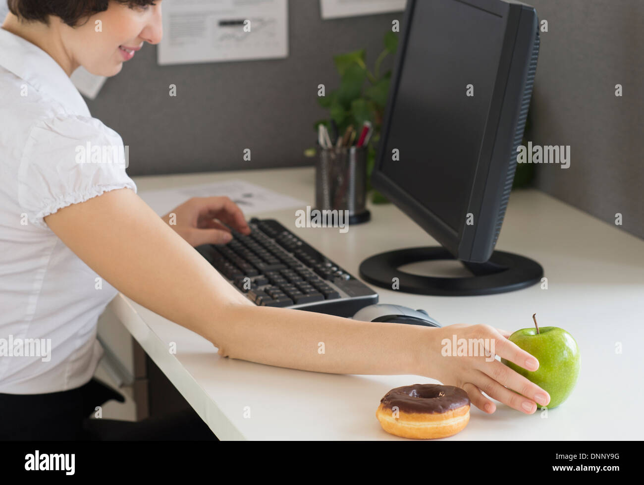 Reaching for apple hi-res stock photography and images - Alamy