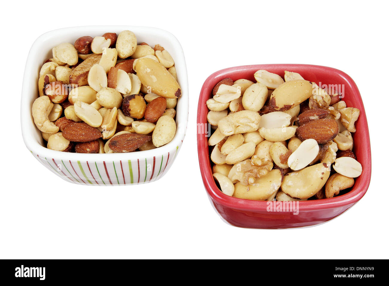 Brazil nuts in container Cut Out Stock Images & Pictures - Alamy