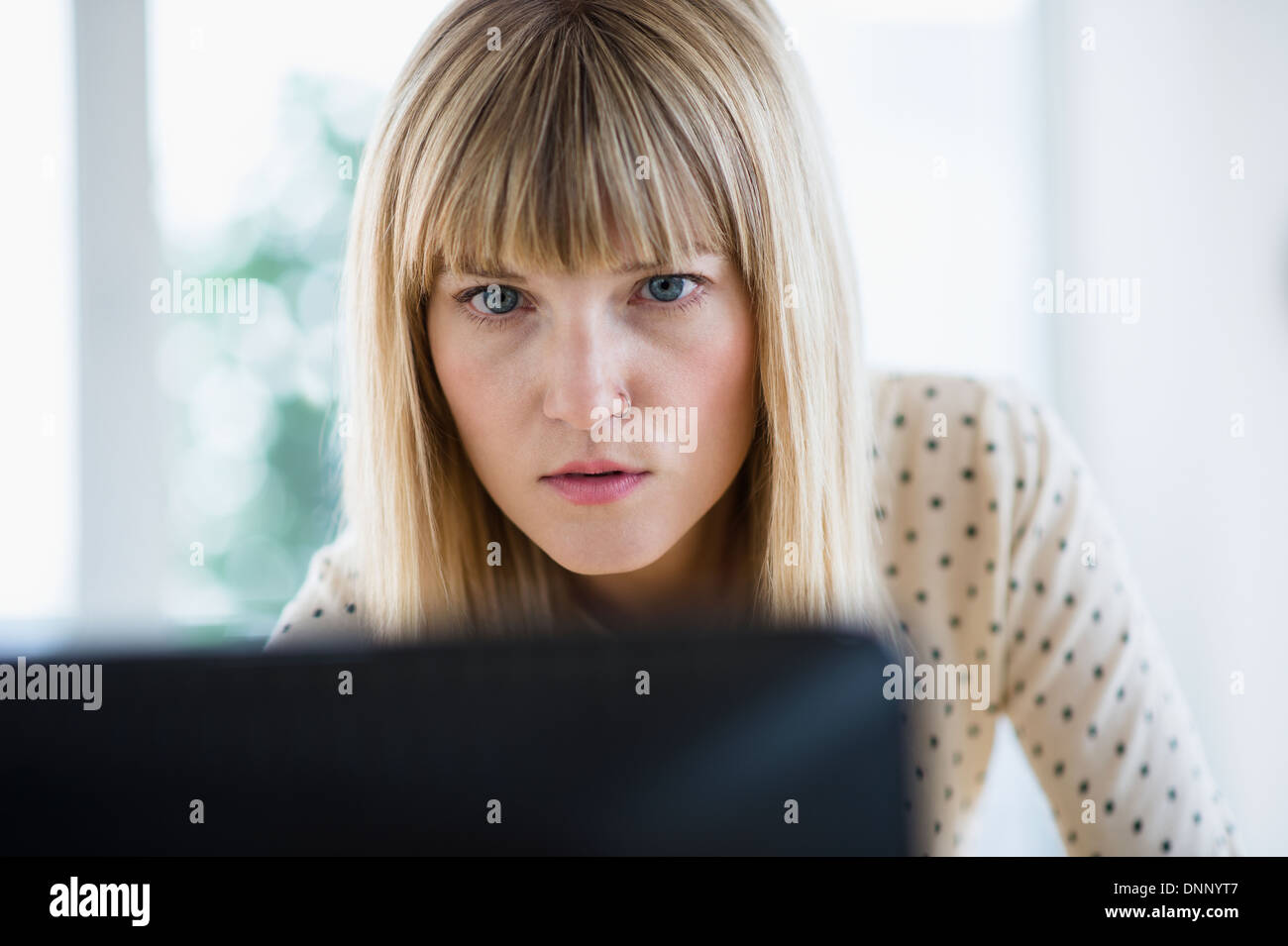Female designer working on computer Stock Photo - Alamy