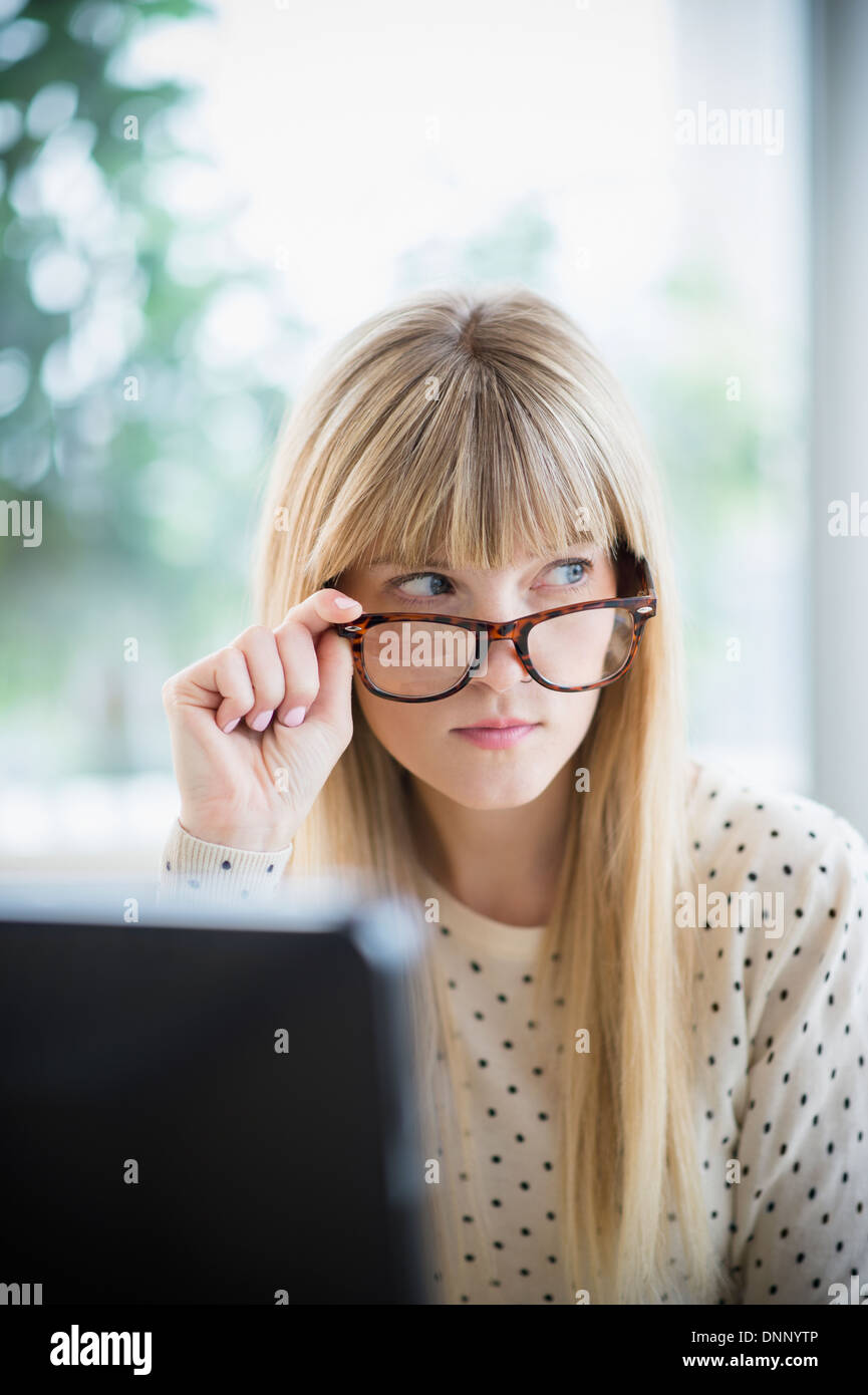 Looking above glasses hi-res stock photography and images - Alamy