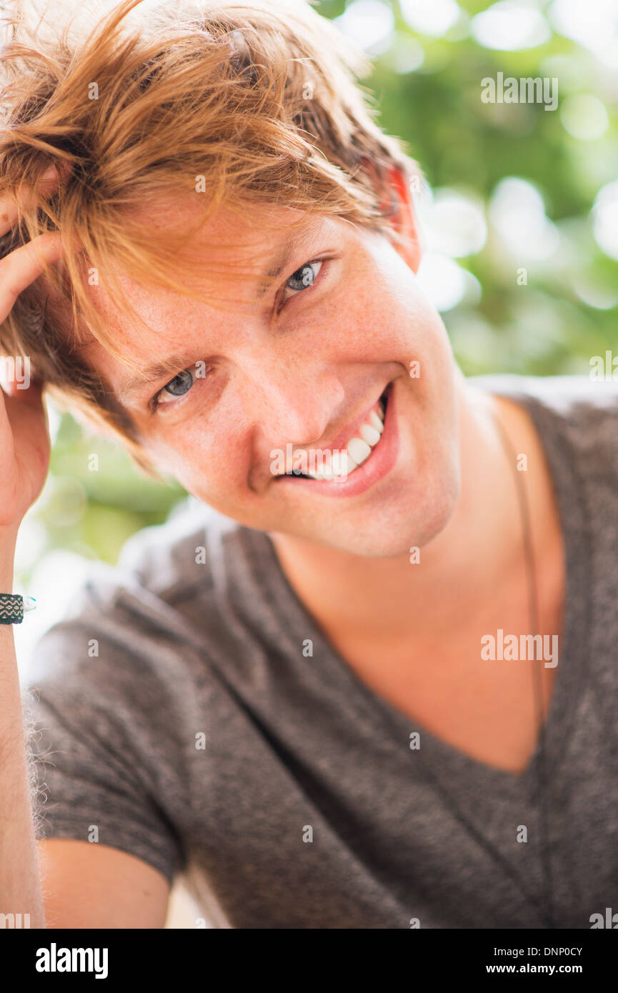 Portrait of man smiling Stock Photo - Alamy