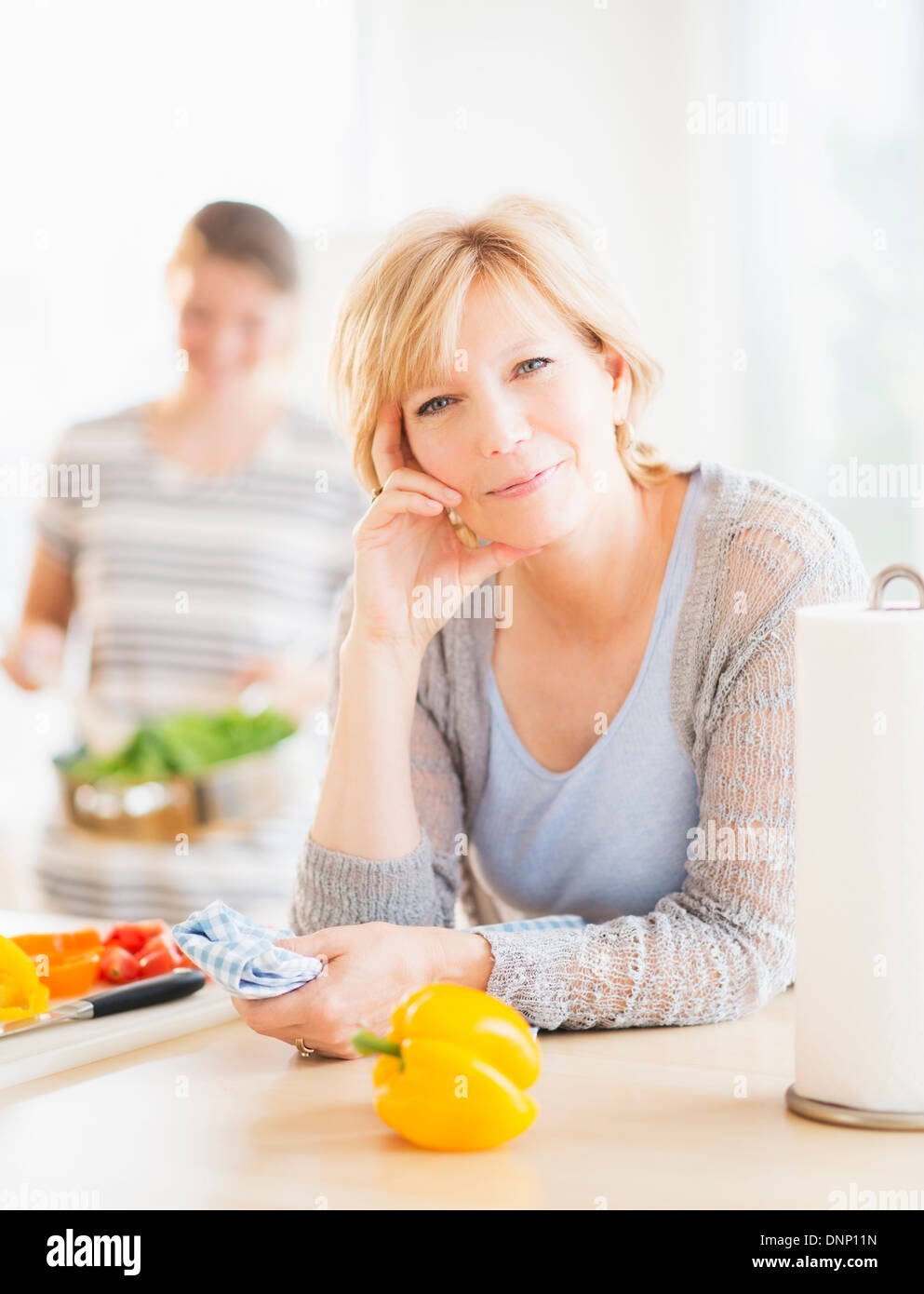 Leaning on kitchen counter hi-res stock photography and images - Alamy