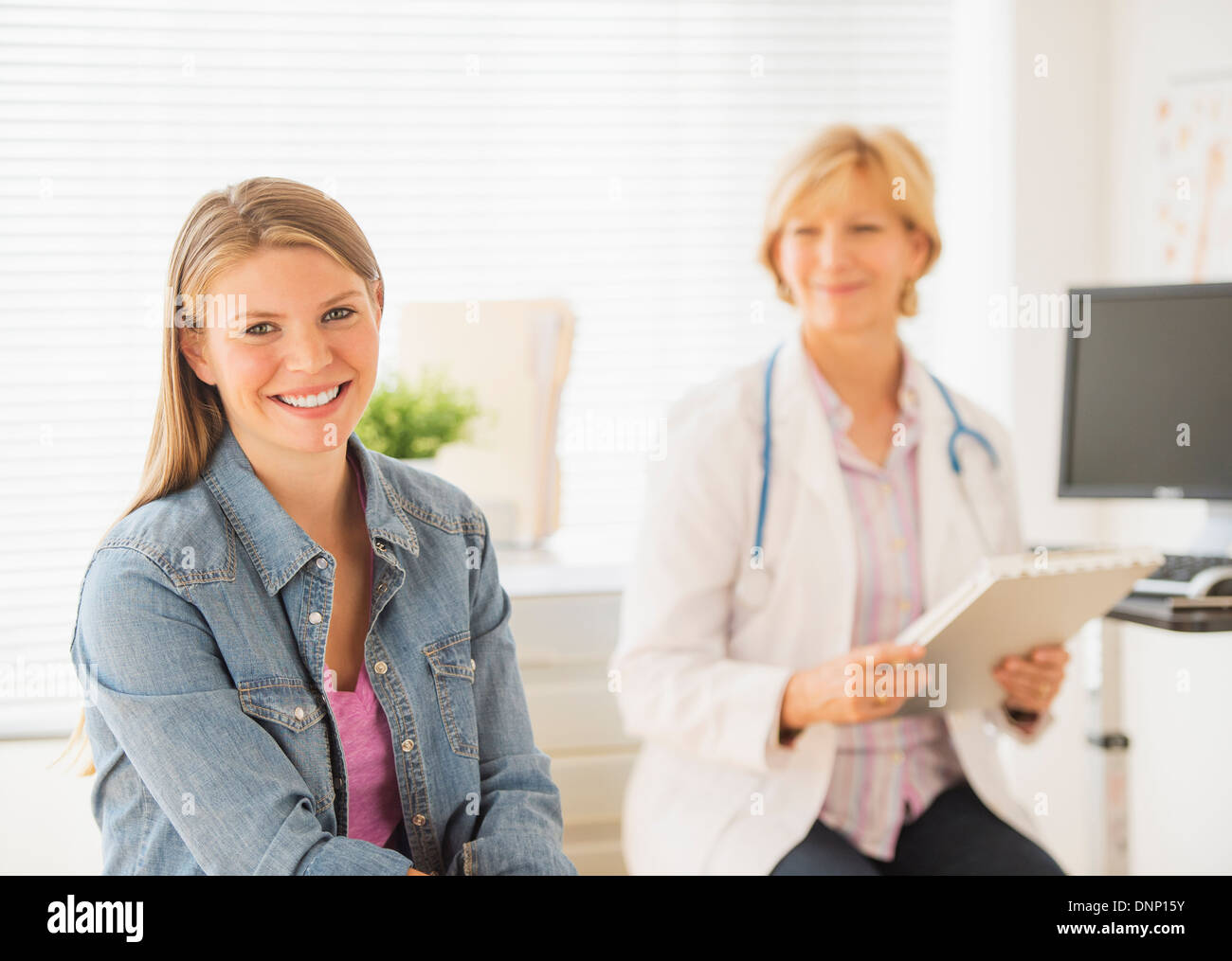 Woman visiting doctor hi-res stock photography and images - Alamy