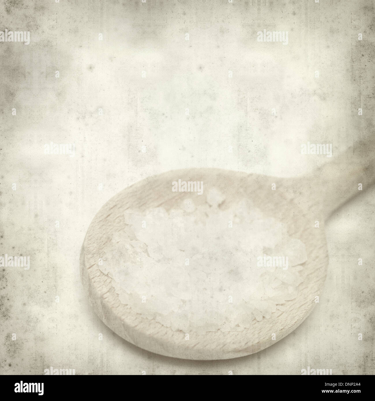 textured old paper background with wooden spoon with rock salt Stock ...