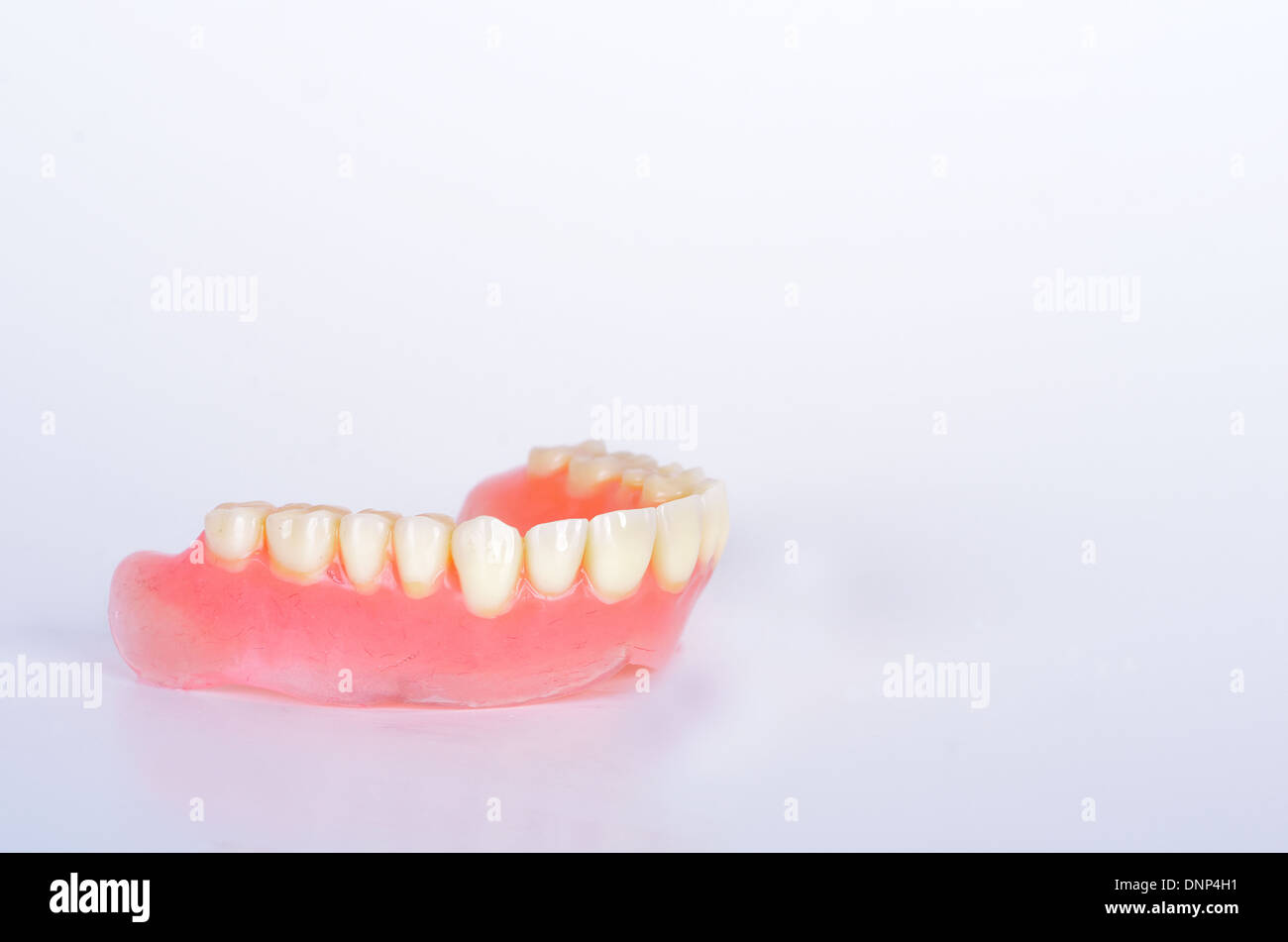 Photo of false teeth Stock Photo - Alamy