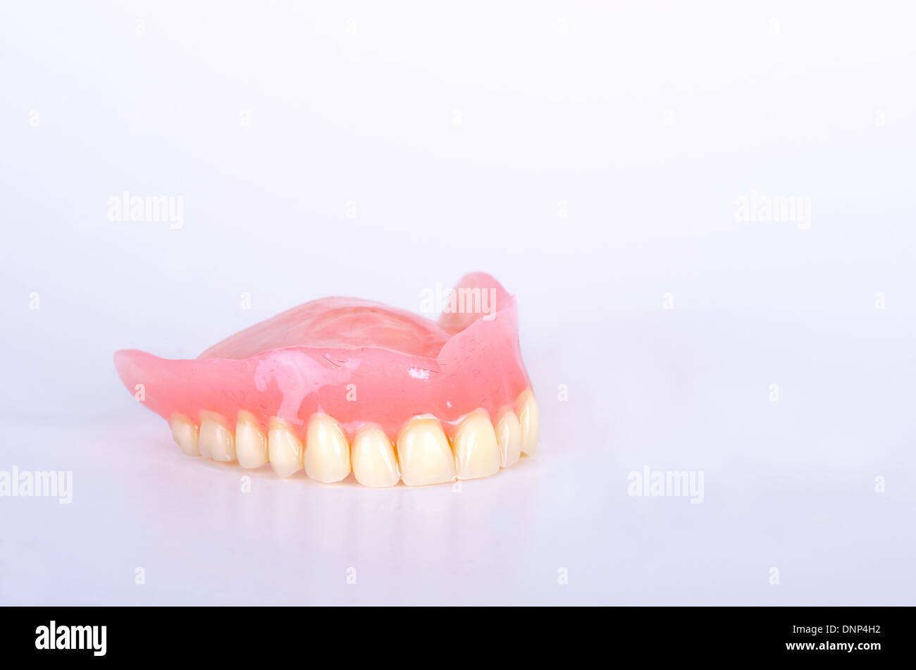 Photo of false teeth Stock Photo - Alamy