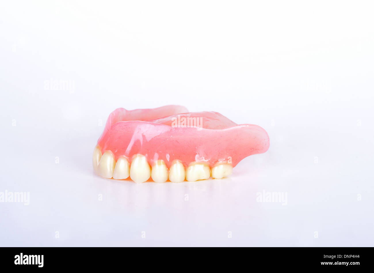 Photo of false teeth Stock Photo - Alamy