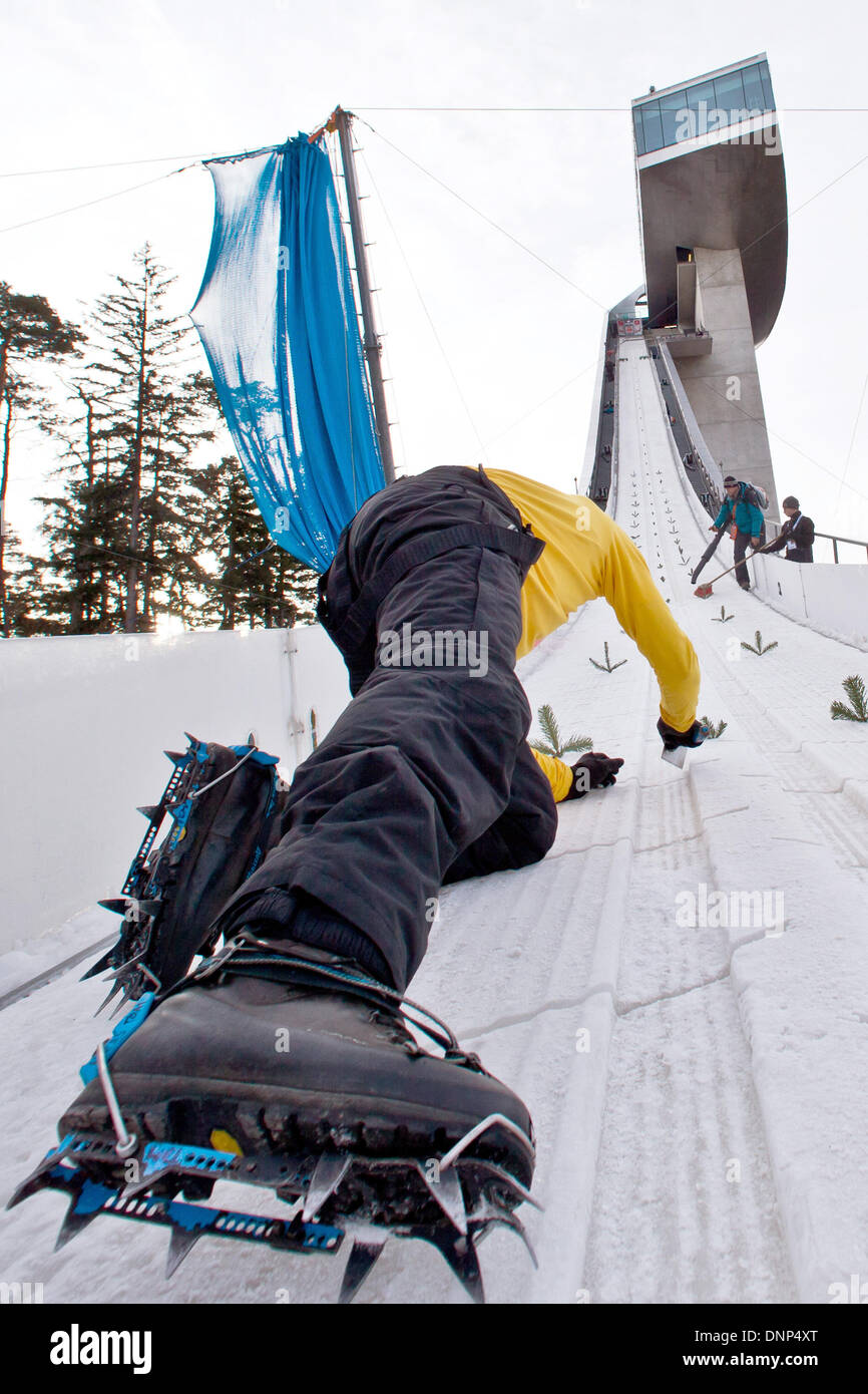 Innsbruck, Austria. 03rd Jan, 2014. Workers prepare the inrun of the ...