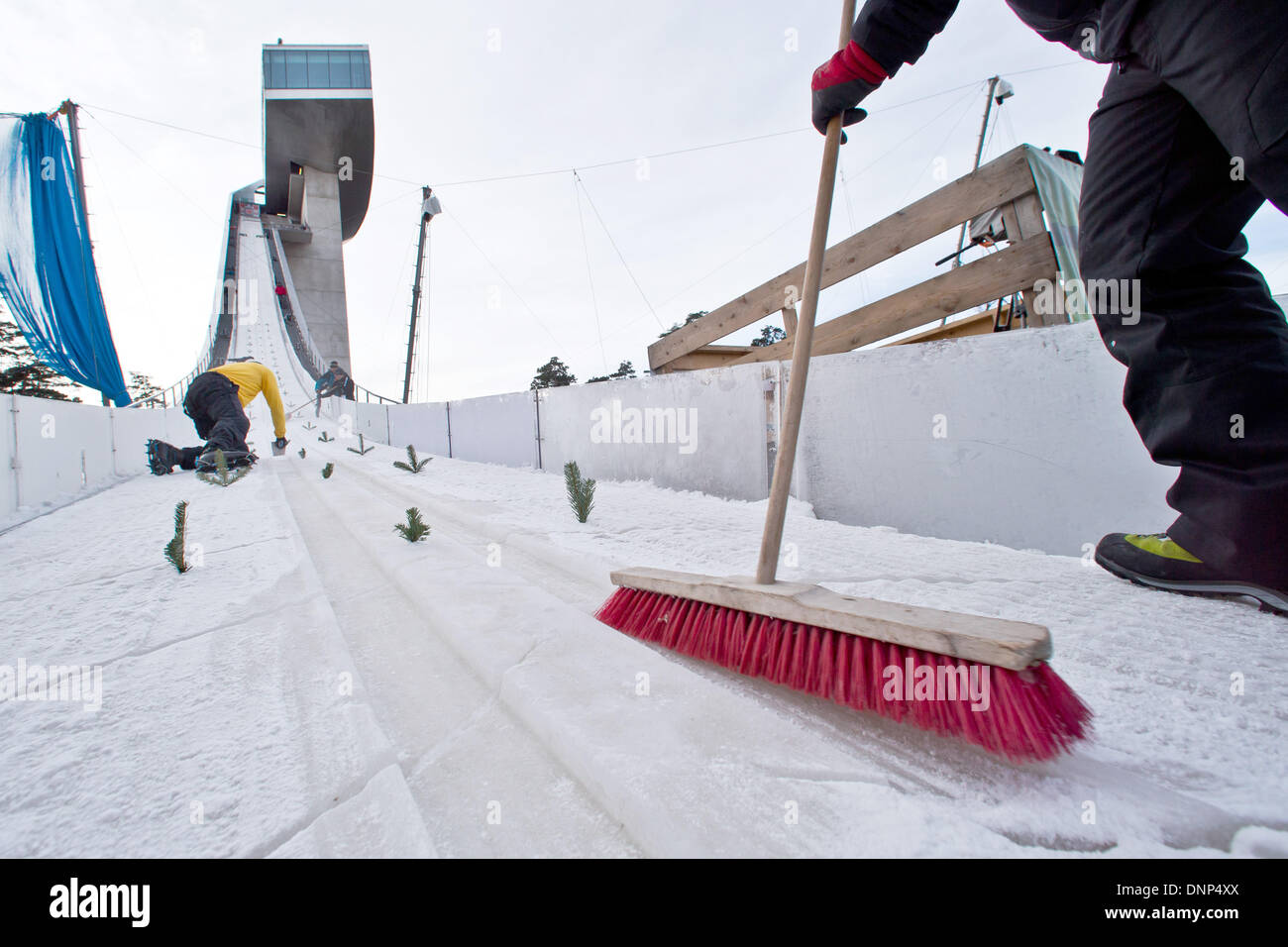 Innsbruck, Austria. 03rd Jan, 2014. Workers prepare the inrun of the ...