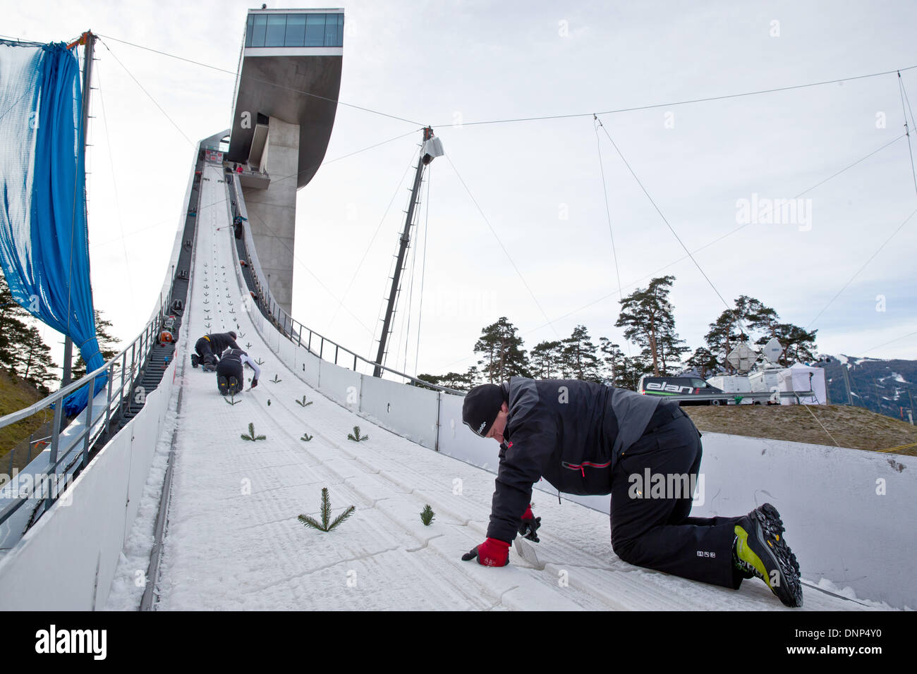 Innsbruck, Austria. 03rd Jan, 2014. Workers prepare the inrun of the ...