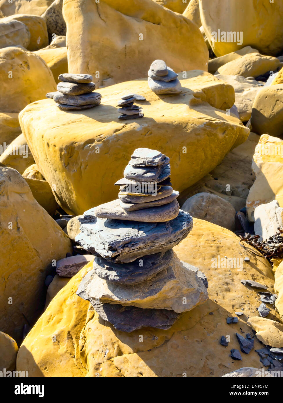 Stone stacks on the rock Stock Photo - Alamy