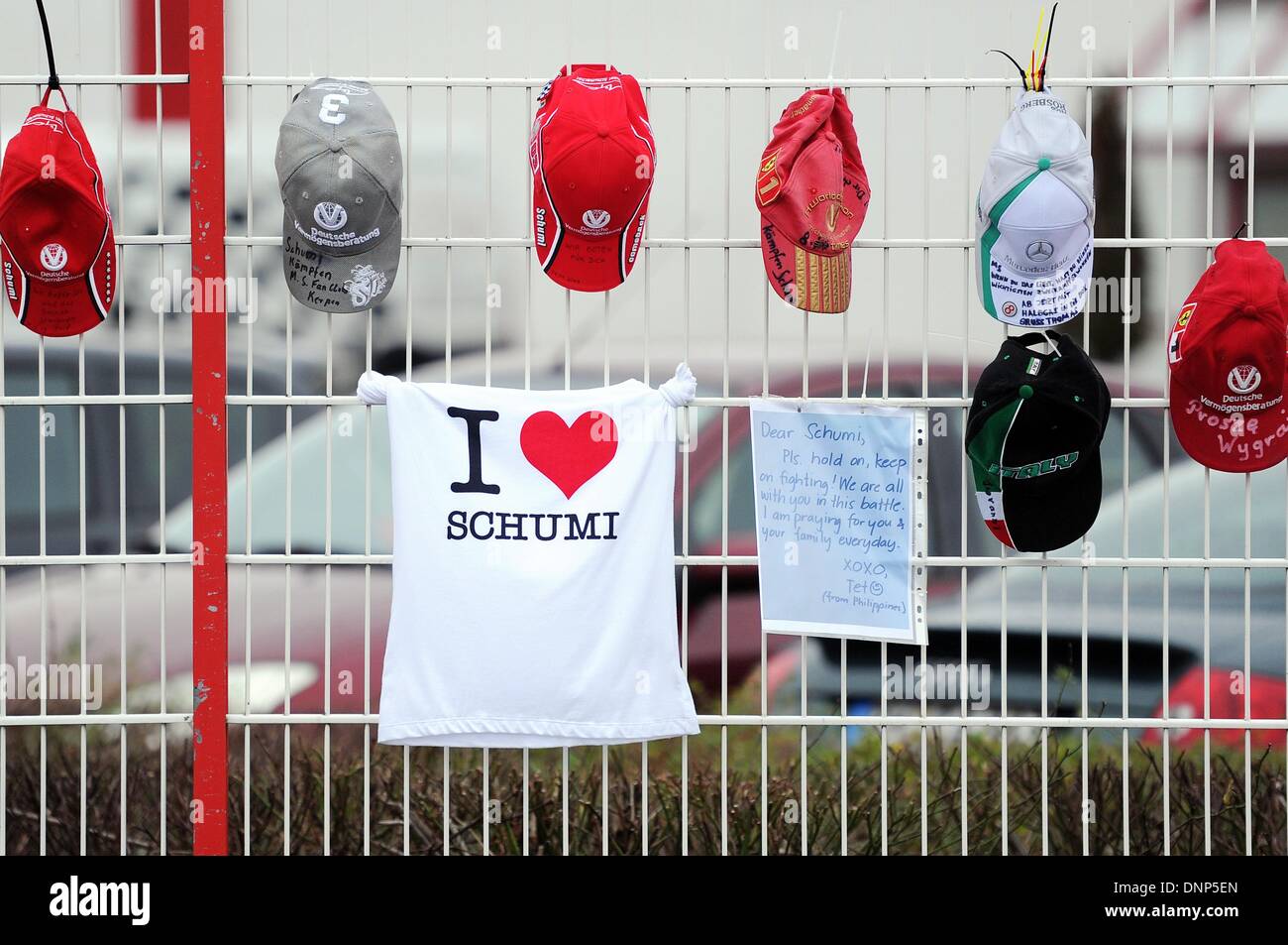 Kerpen, Germany. 03rd Jan, 2014. Schumi fan caps and a T-shirt reading ...