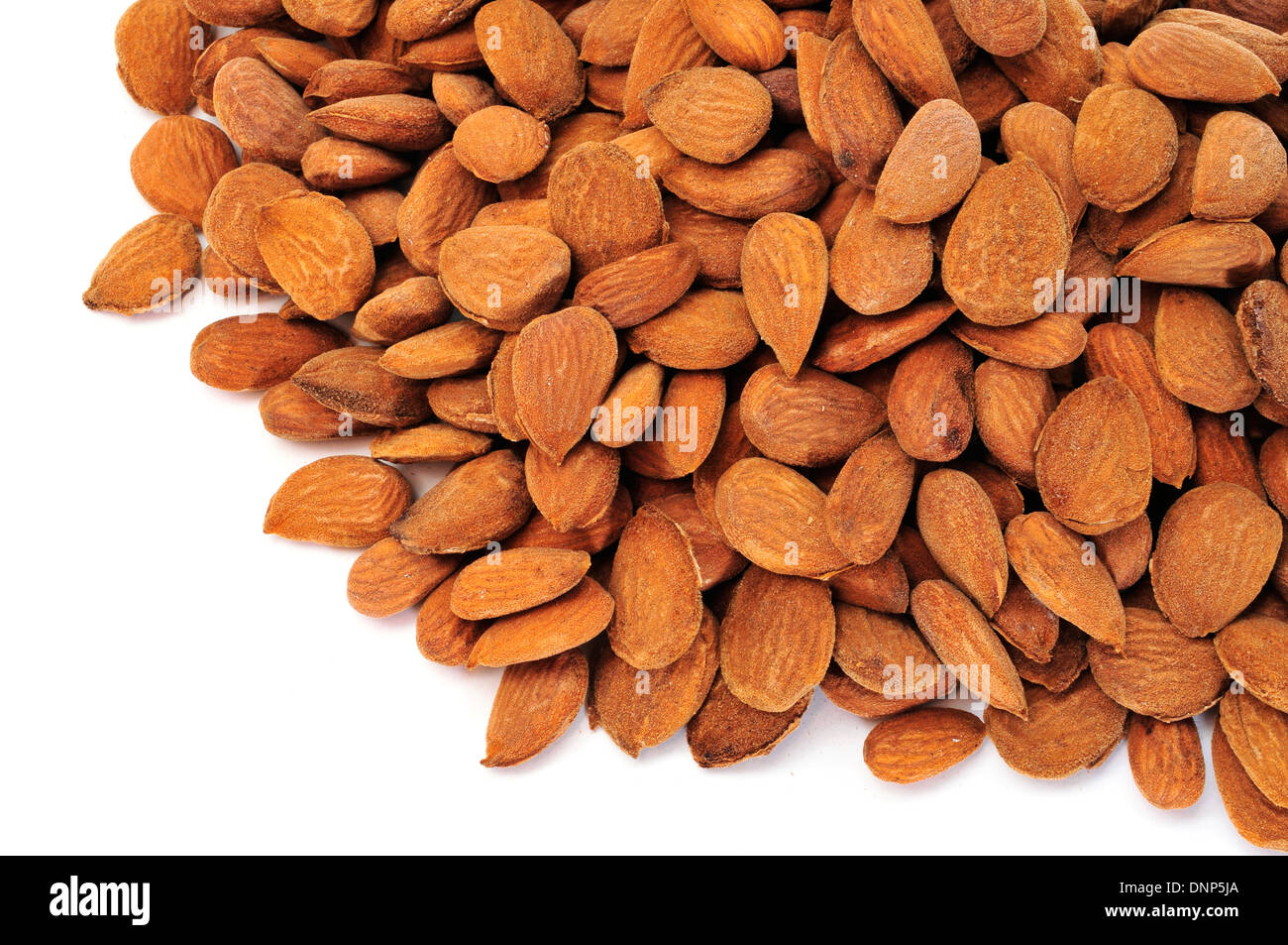 closeup of a pile of shelled almonds on a white background Stock Photo ...