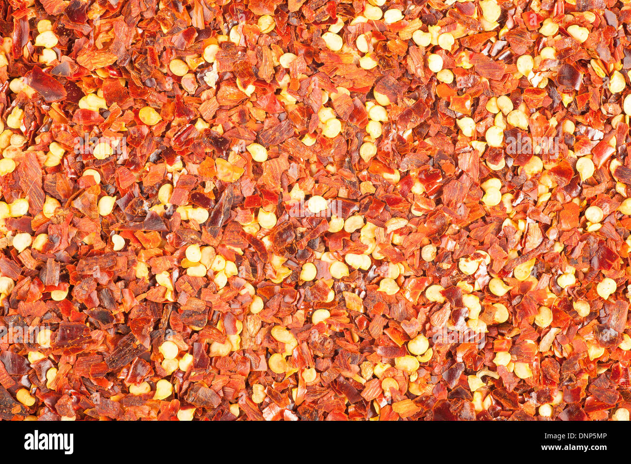 Crushed Red Pepper food texture or background Stock Photo - Alamy