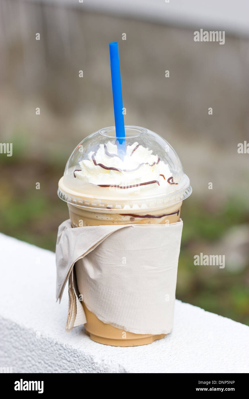 Cappuccino with whipping cream and chocolate syrup topping Stock Photo ...