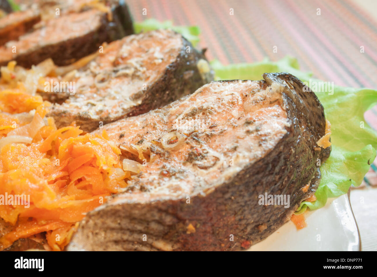 fish salmon cooked dish seafood closeup plate nobody Stock Photo - Alamy