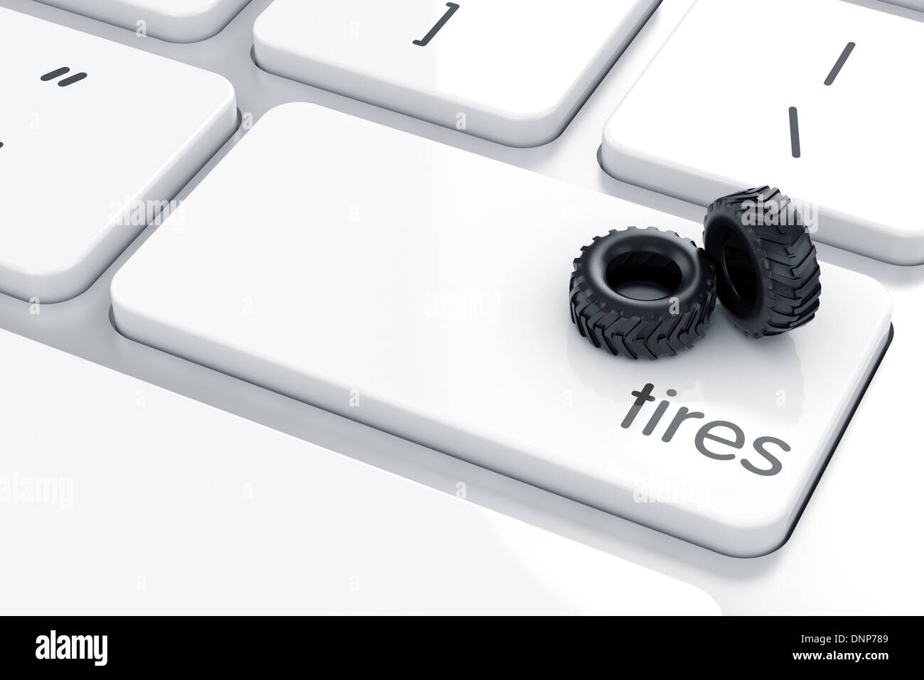 Tires on the computer keyboard. Transportation concept Stock Photo - Alamy