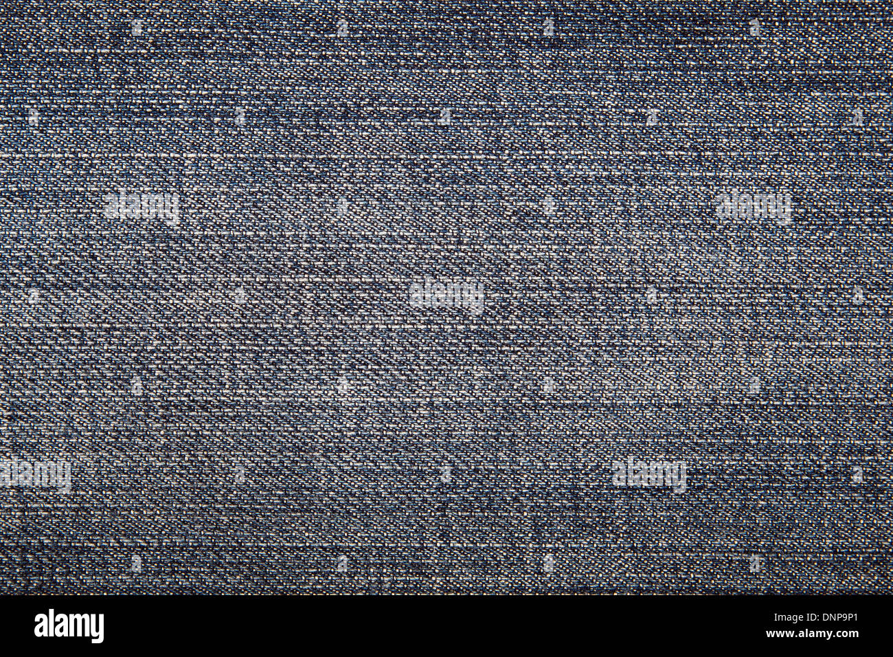 The worn blue jeans, a textile background Stock Photo - Alamy