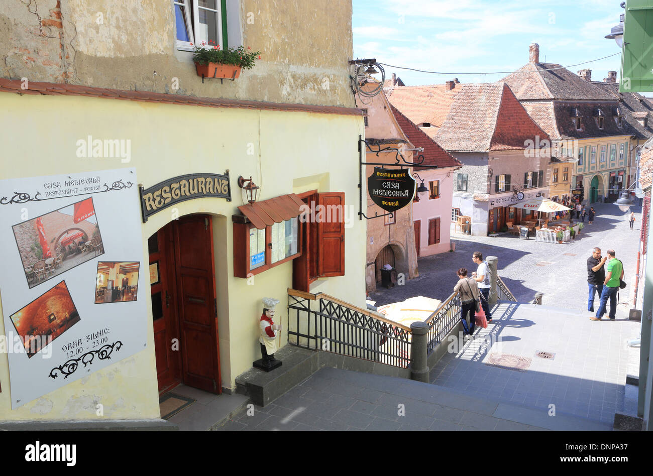 A restaurant in The Lower Town in the historic centre of Sibiu, a ...