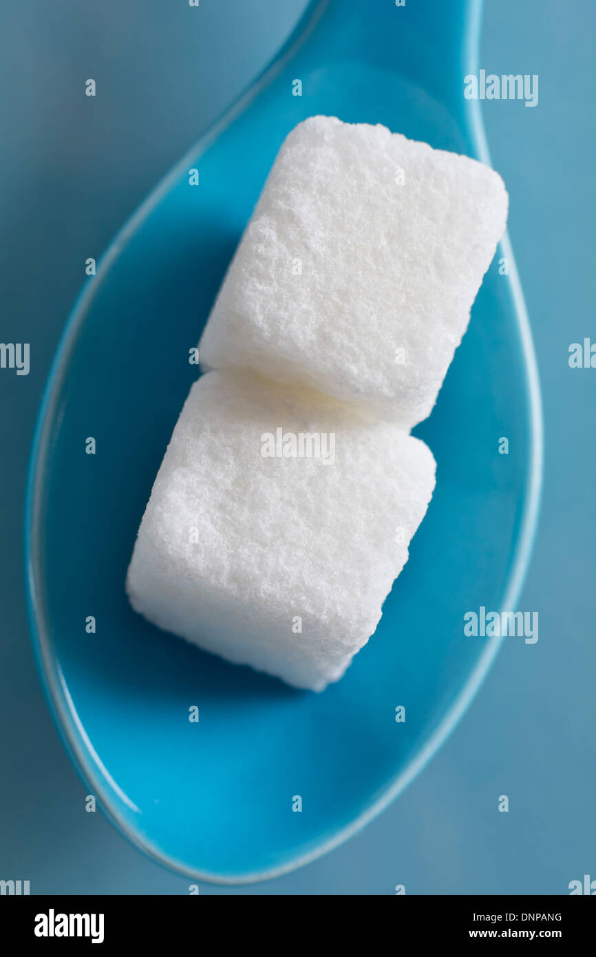 Sugar cubes on spoon hi-res stock photography and images - Alamy