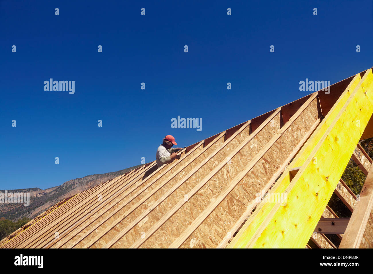 USA, Colorado, Construction worker working on construction site Stock ...