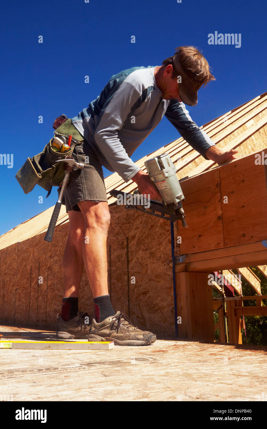 USA, Colorado, Construction worker working on construction site Stock ...