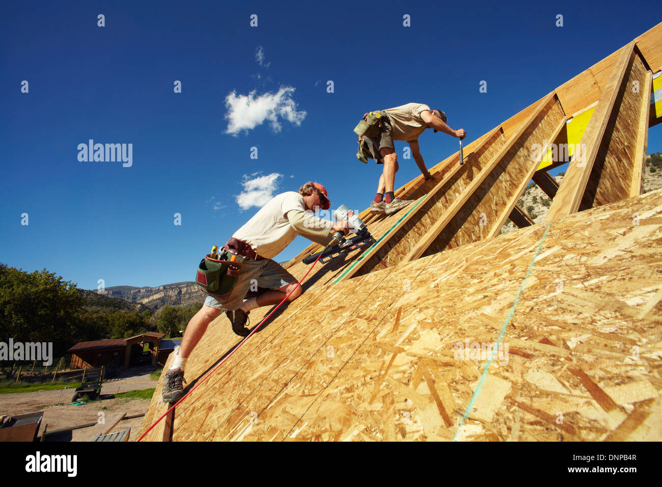 USA, Colorado, Construction workers working on construction site Stock ...