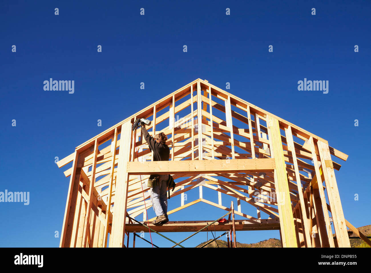 USA, Colorado, Construction worker working on construction site Stock ...
