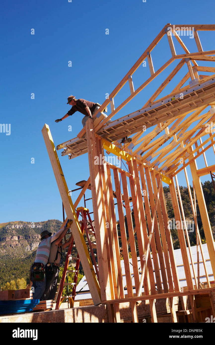 USA, Colorado, Construction workers working on construction site Stock ...