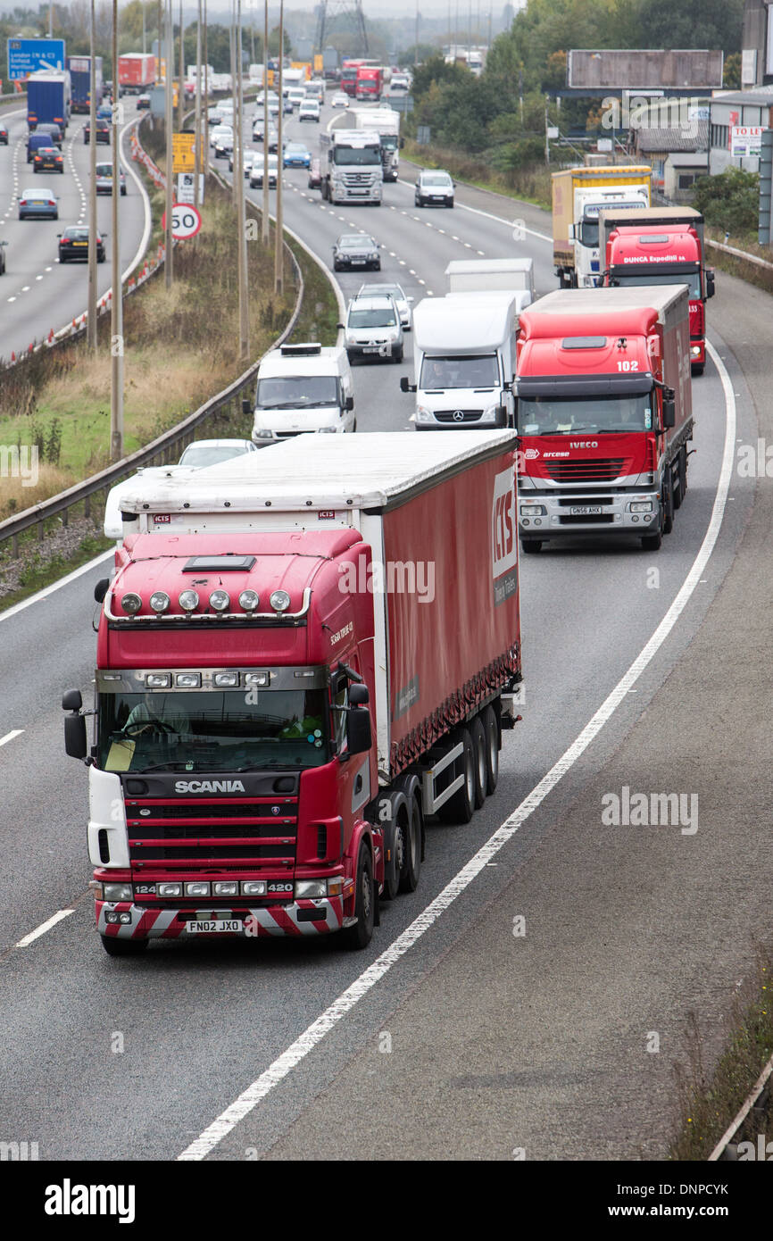 Trucks and lorries on the motorway Stock Photo - Alamy
