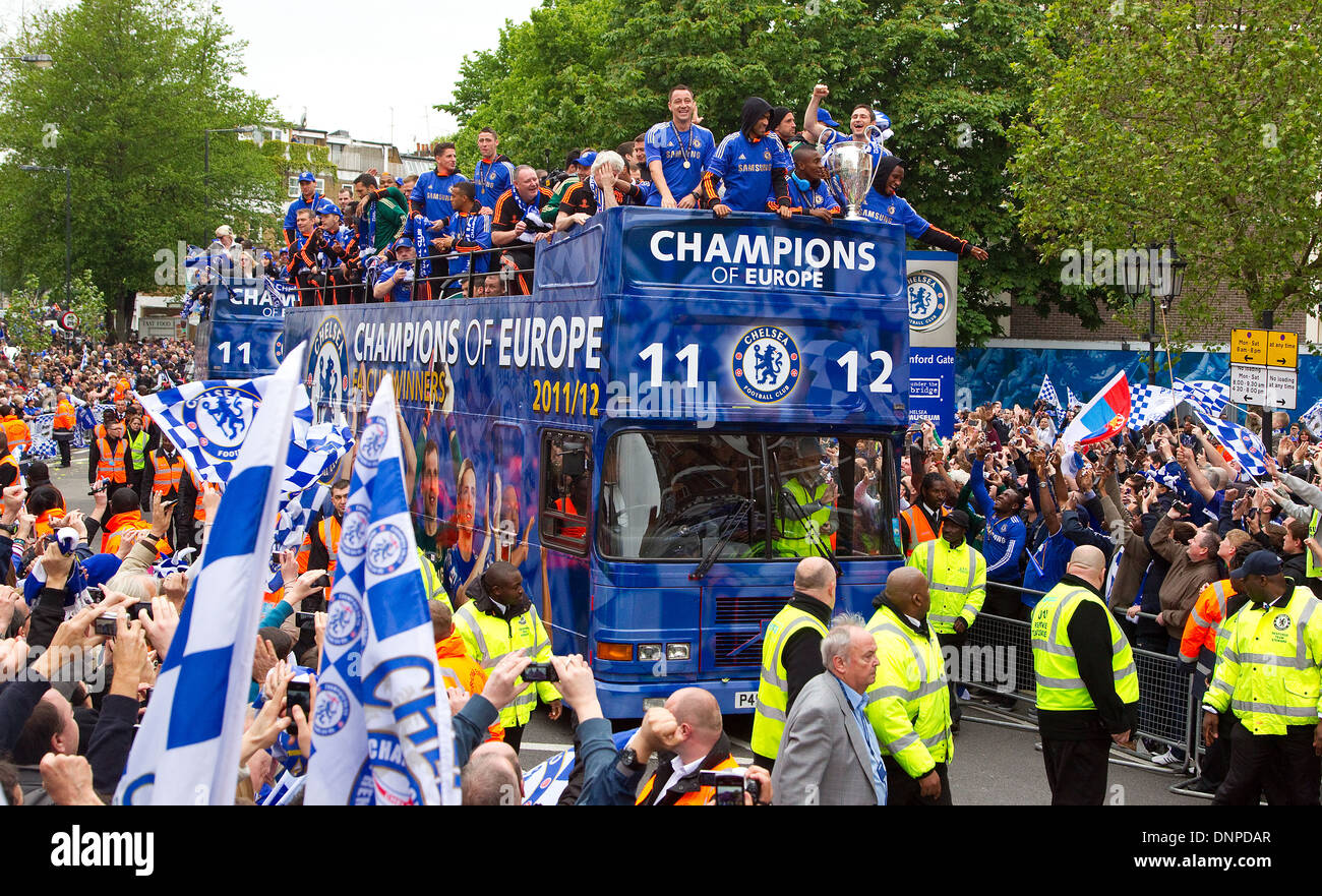 Chelsea players and staff parade the European and F A Cups in an open ...