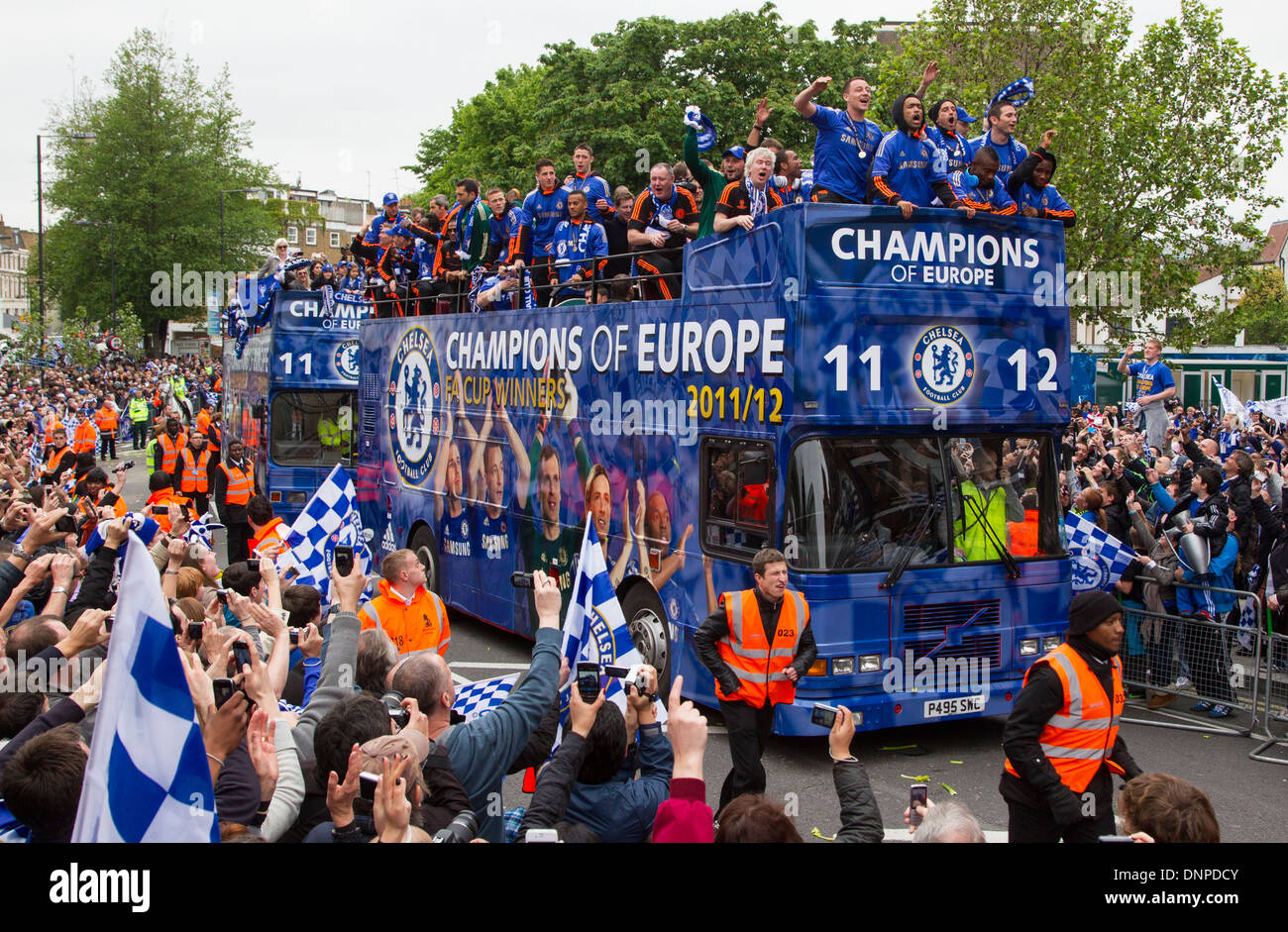 Chelsea players and staff parade the European and F A Cups in an open ...