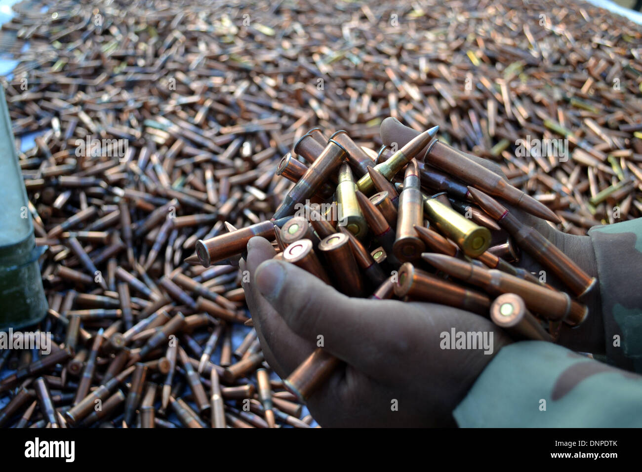 Quetta. 3rd Jan, 2014. A Pakistani security official displays seized ...