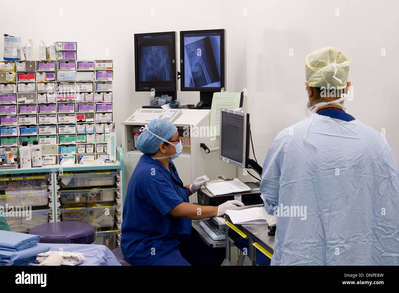 Knee operation -Hospital theatre-staff at work-Instruments for ...