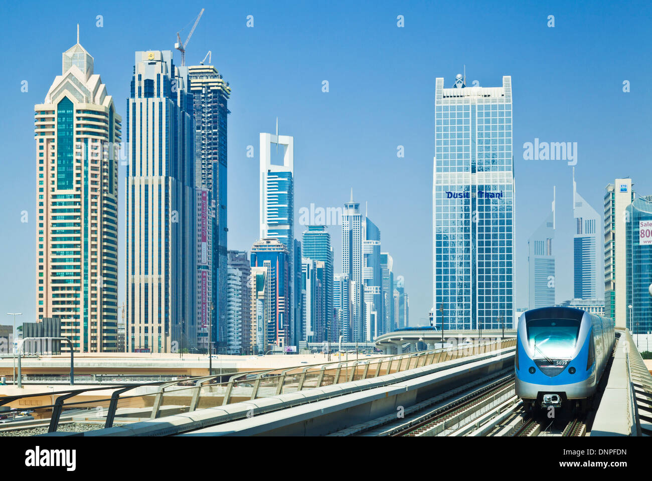 Sheikh Zayed Road skyline high rise skyscrapers, metro train, Dubai ...