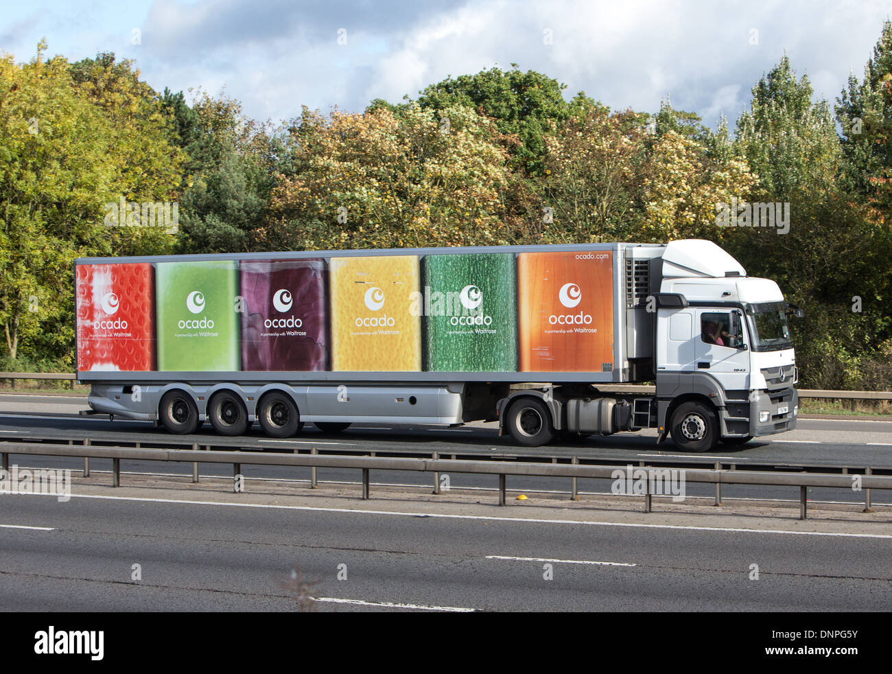 Lorry delivering cargo on the motorway Stock Photo - Alamy