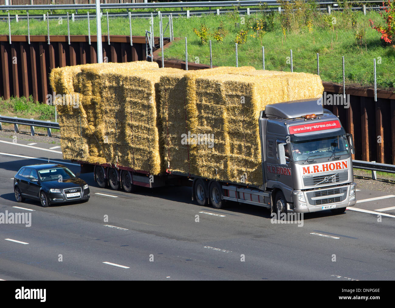 Lorry delivering cargo on the motorway Stock Photo - Alamy