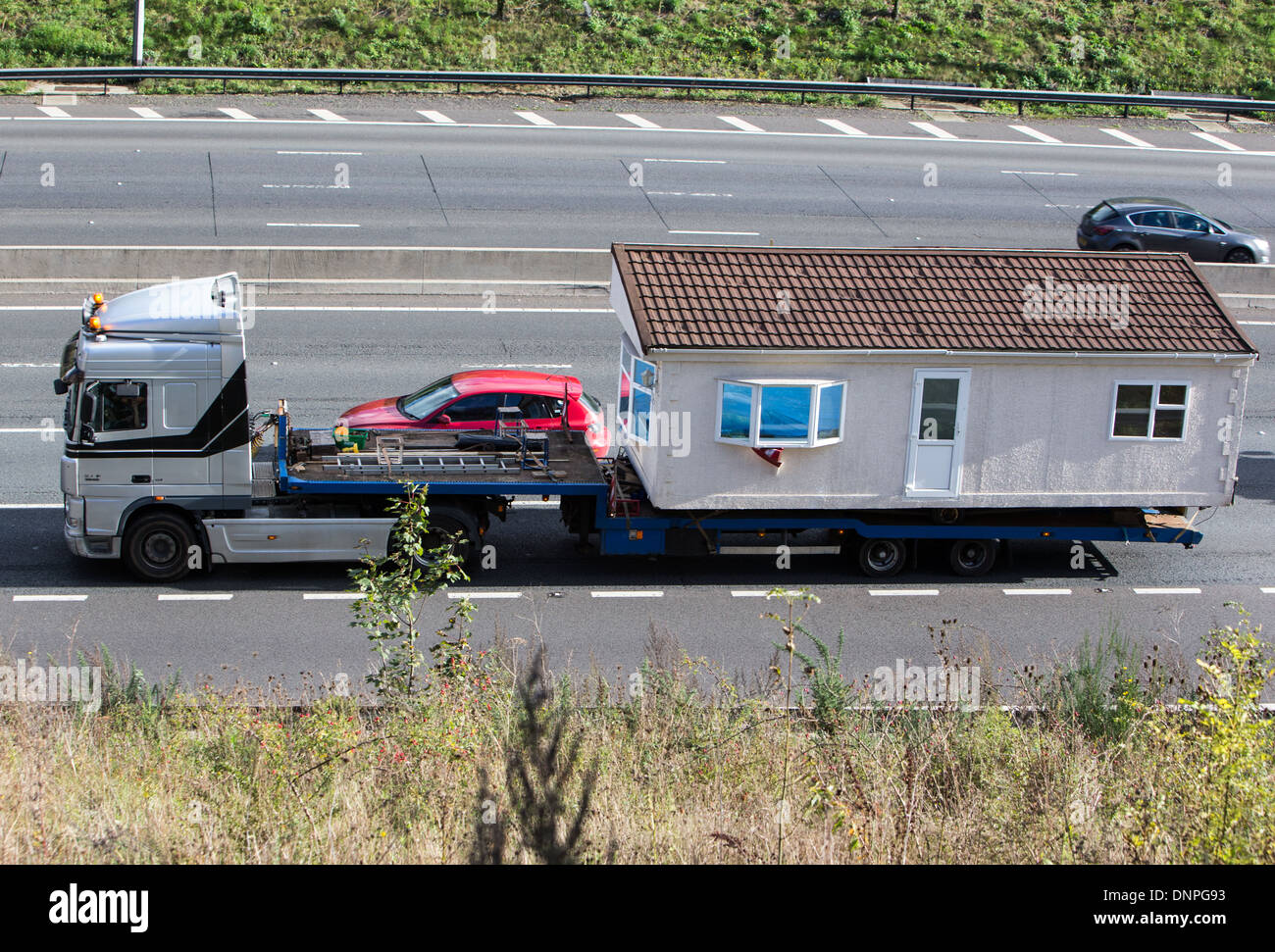 Lorry delivering cargo on the motorway Stock Photo - Alamy