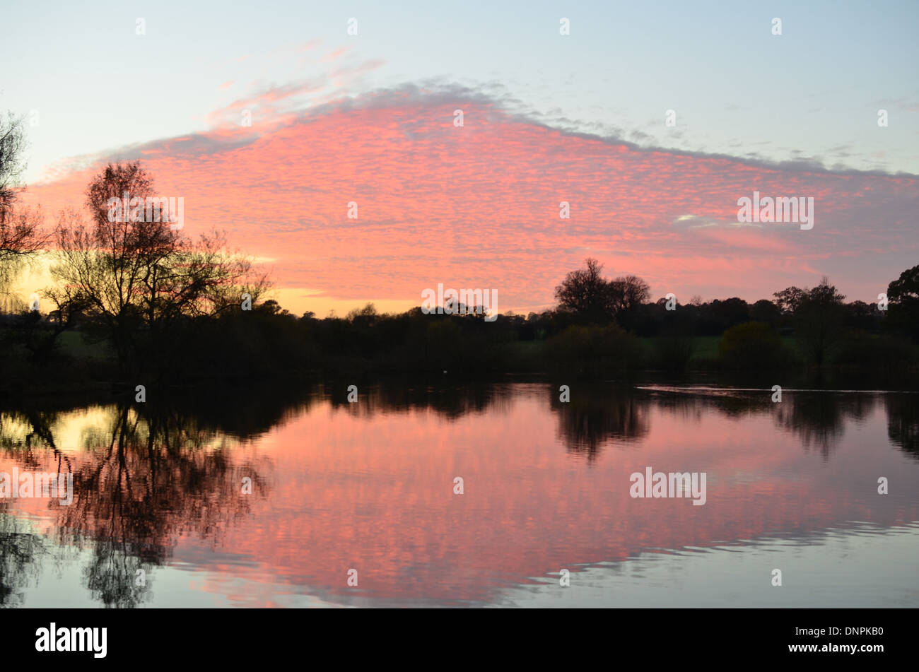 Sunset reflections over water hi-res stock photography and images - Alamy