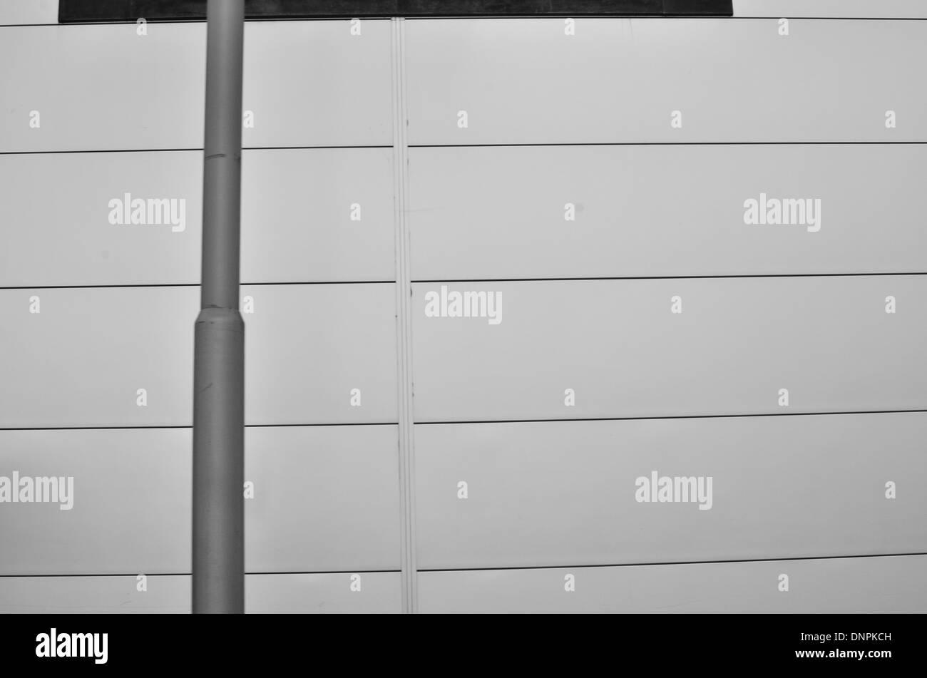 lap post on a white wall Stock Photo - Alamy