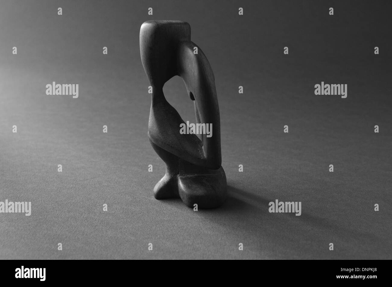 thinking man ,wood ,black&white Sculpture Stock Photo - Alamy
