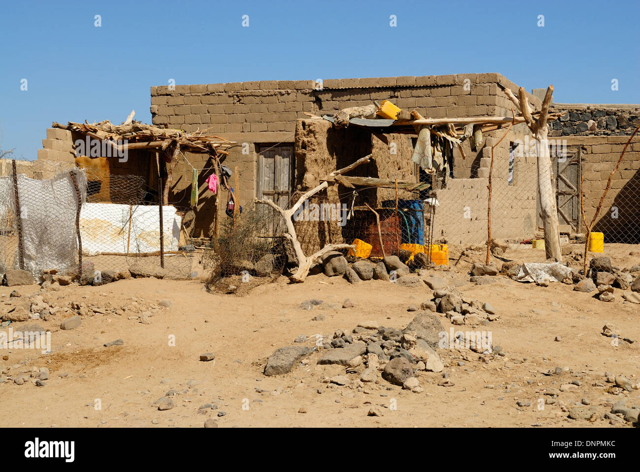 Small Afar house built with rocks and sticks of wood in south of ...