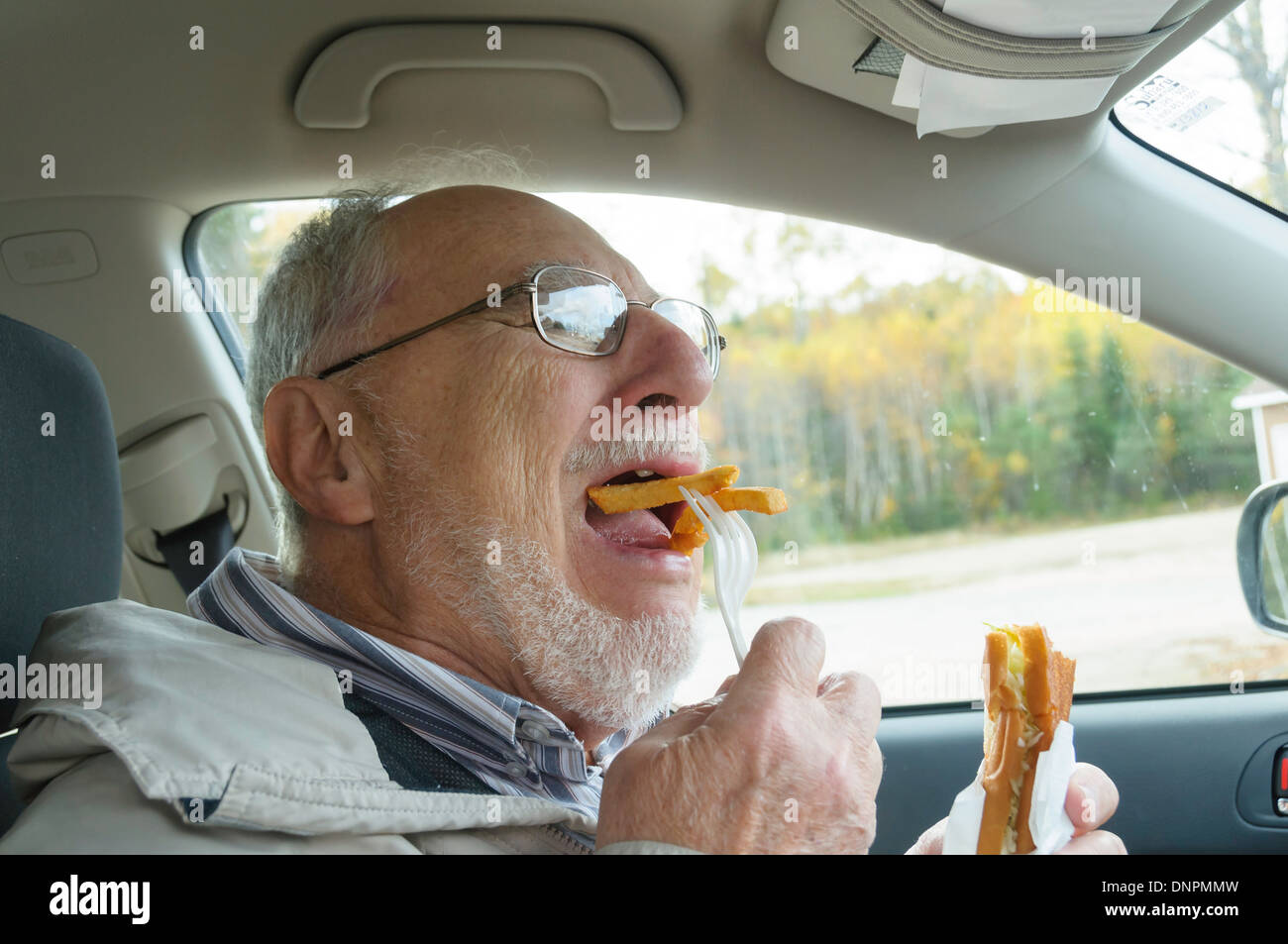 Junk food in car hi-res stock photography and images - Alamy