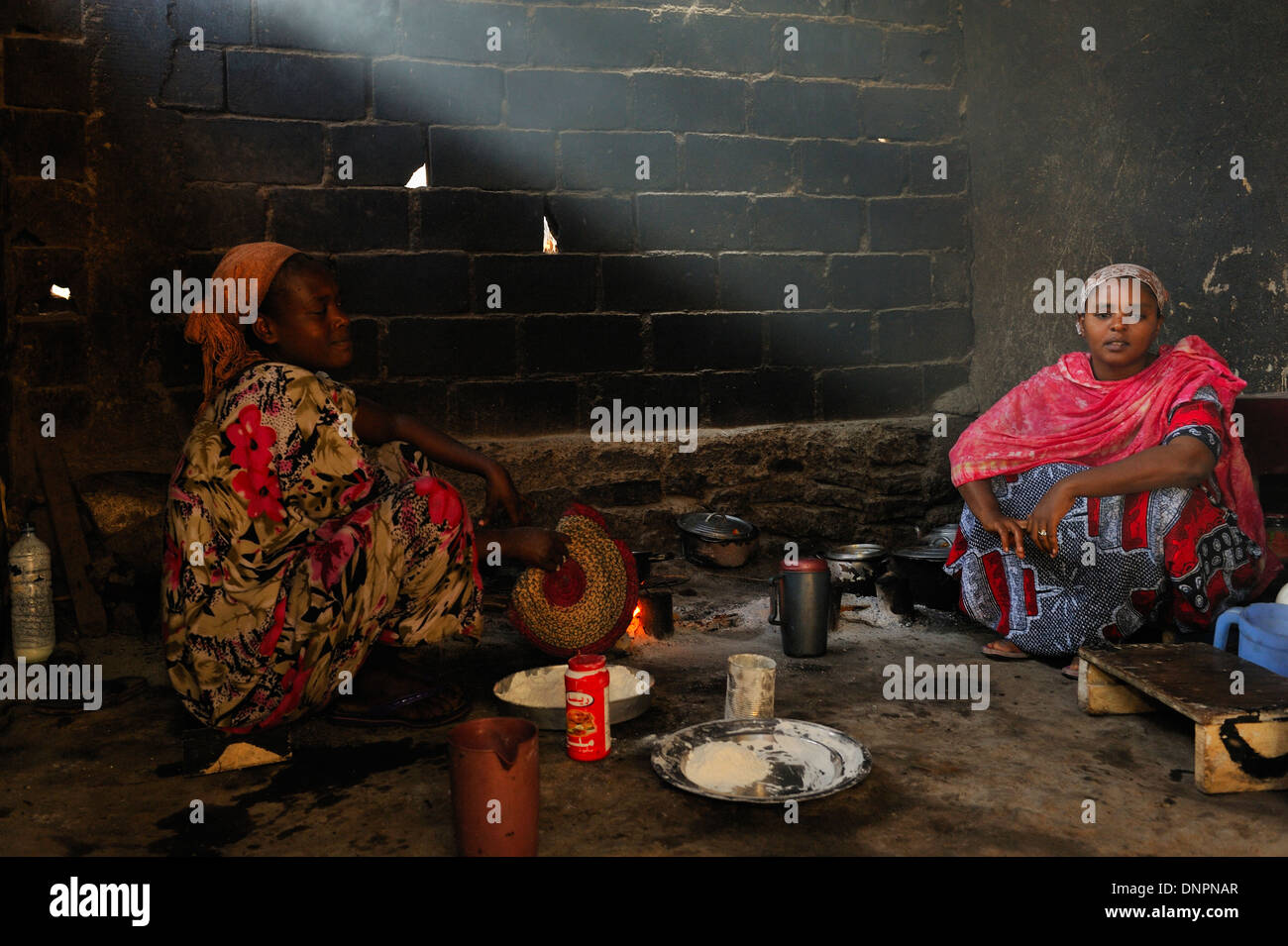 Djiboutian women cooking in a hut in a village in the Day forest in ...